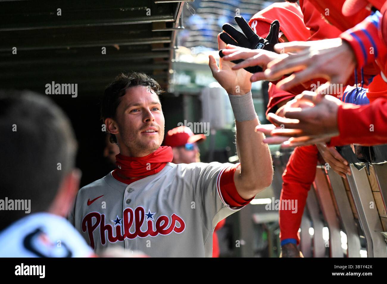Philadelphia Phillies' Max Kepler celebrates in the dugout after he ...