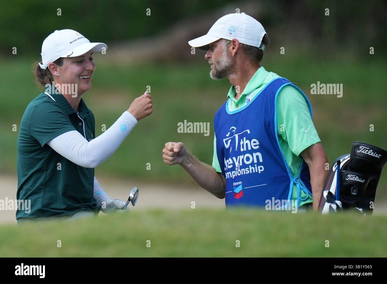 Lindy Duncan celebrates her shot out of the bunker with her caddie ...