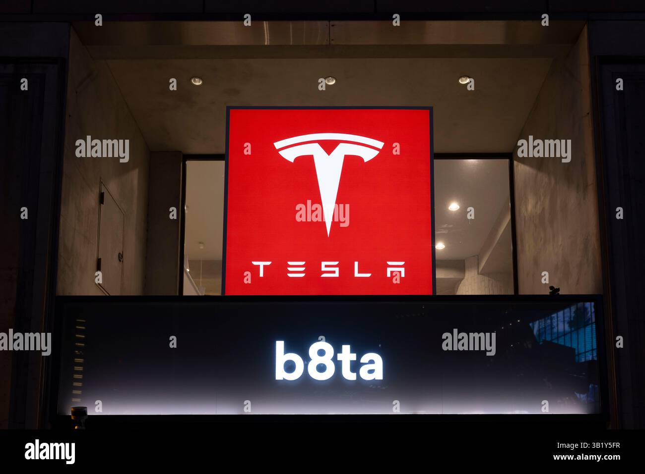 Tesla branding on a Tesla pop-up store near Shibuya crossing. In April ...