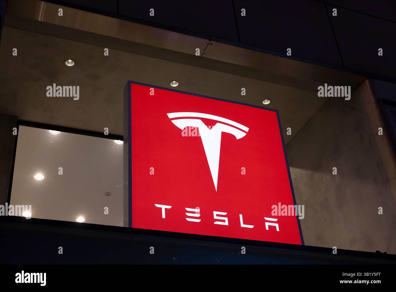 Tesla branding on a Tesla pop-up store near Shibuya crossing. In April ...