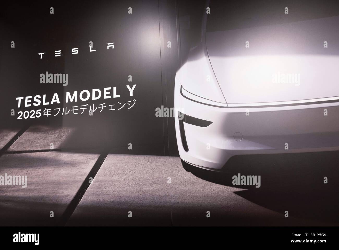 Tesla model Y wall poster inside the Tesla pop-up store in Shibuya ...