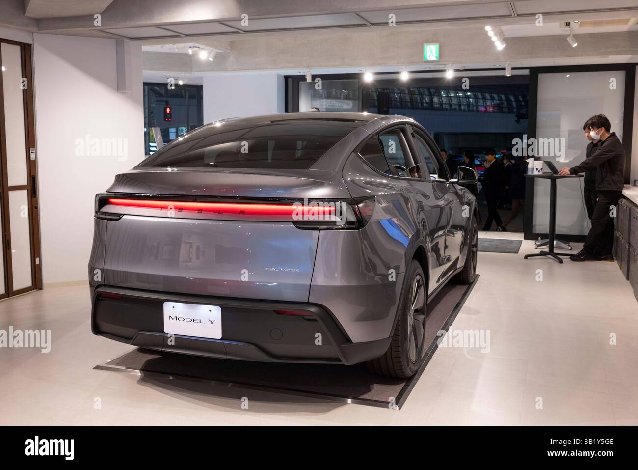 Tesla model Y on display inside the Tesla pop-up store near Shibuya ...