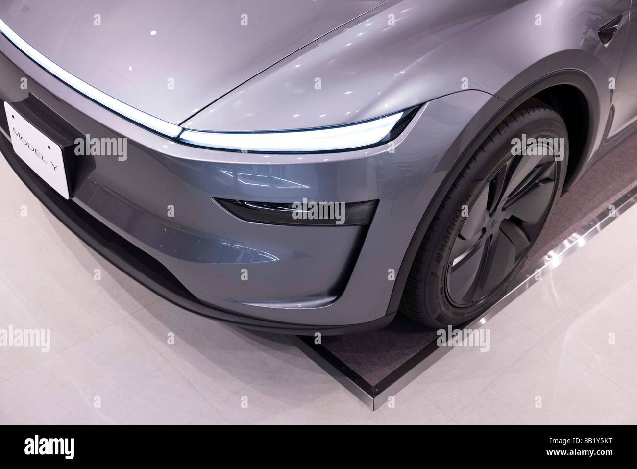 Tesla model Y on display inside the Tesla pop-up store near Shibuya ...
