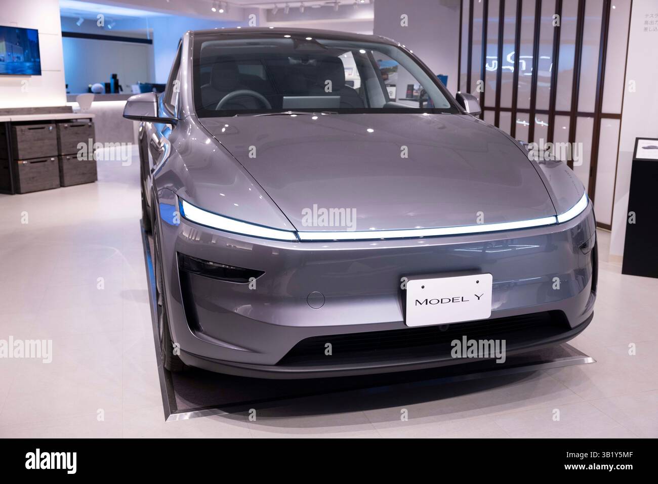 Tesla model Y on display inside the Tesla pop-up store near Shibuya ...