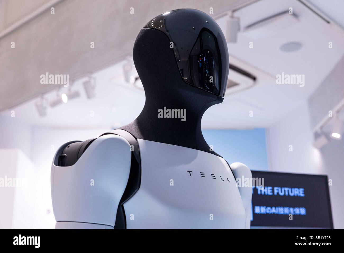 Japan. 25th Apr, 2025. Tesla Optimus humanoid robot on display inside ...