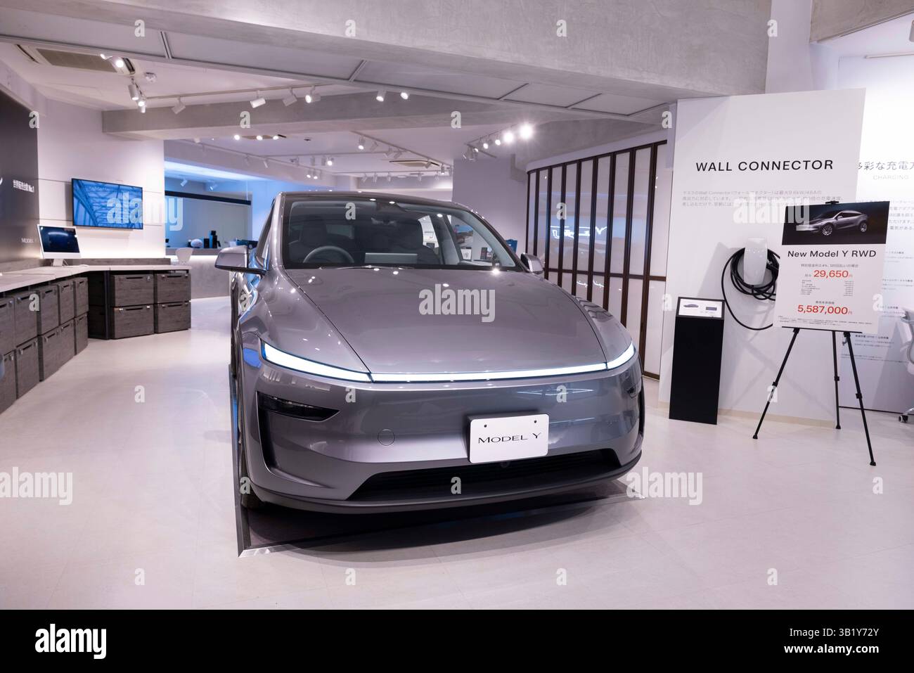 Japan. 25th Apr, 2025. Tesla model Y on display inside the Tesla pop-up ...
