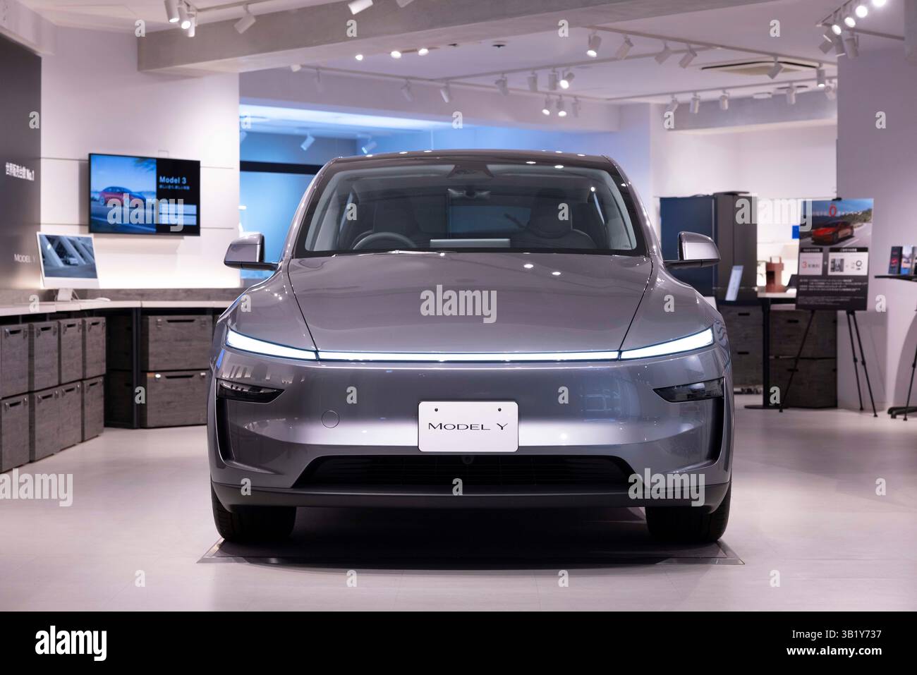 Japan. 25th Apr, 2025. Tesla model Y on display inside the Tesla pop-up ...