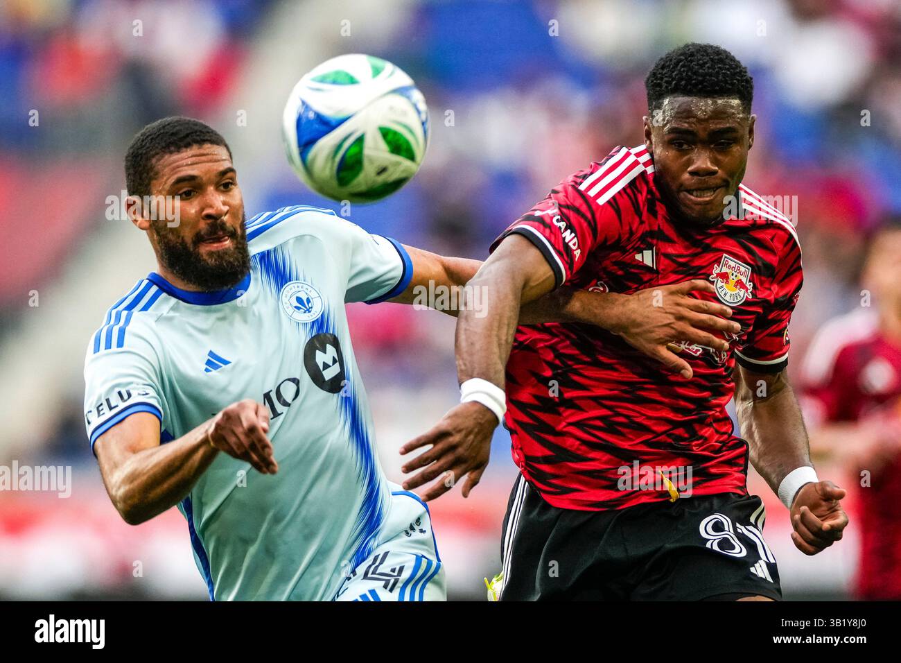 New York Red Bulls forward Serge Ngoma (81) fights for the ball against ...