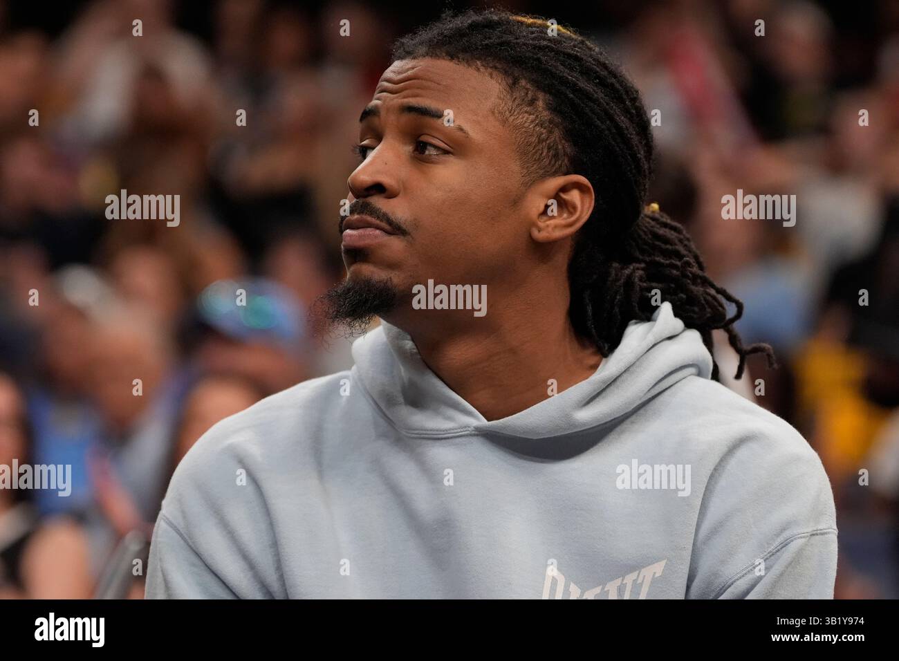 Memphis Grizzlies guard Ja Morant watches from the bench during the ...