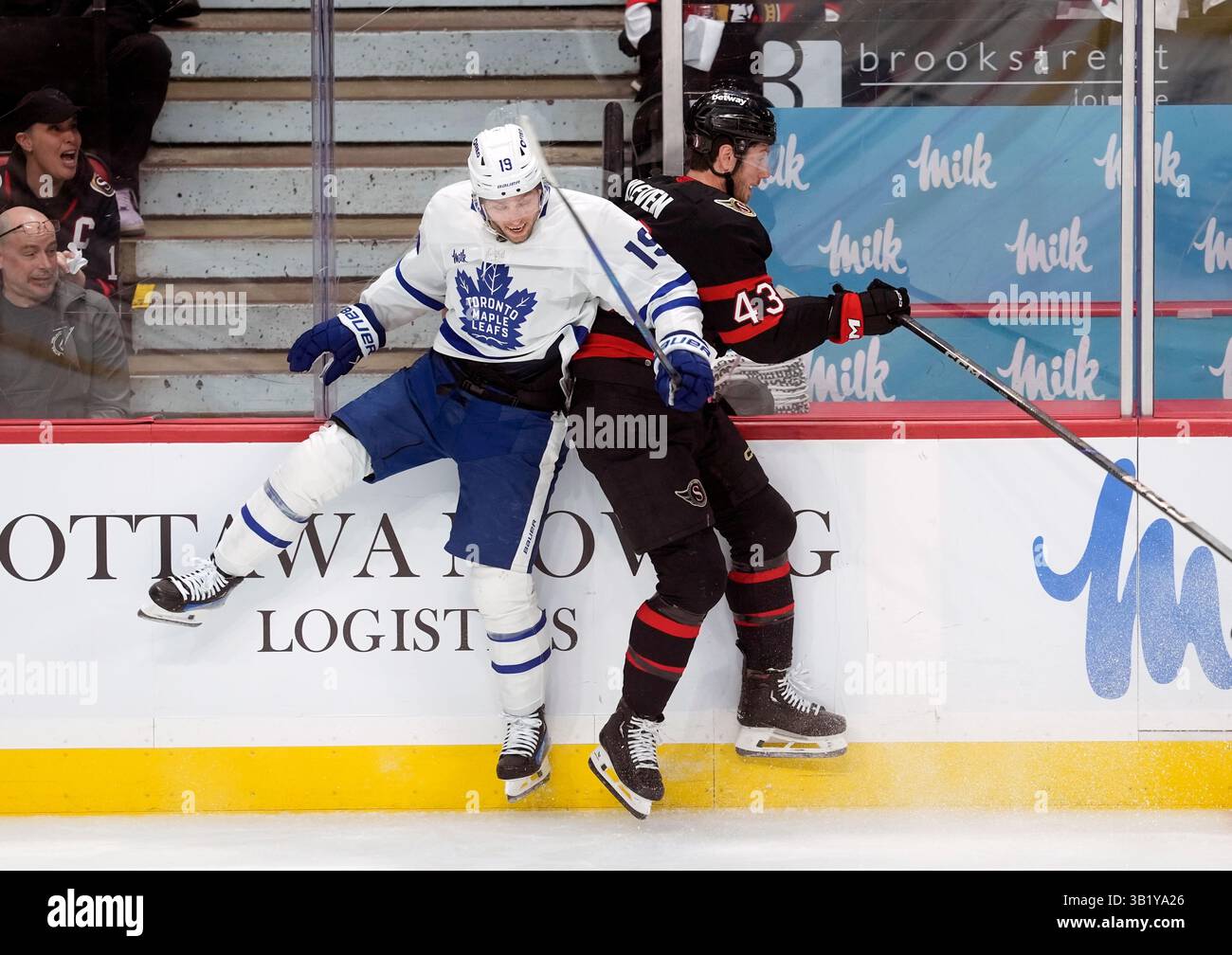 Toronto Maple Leafs' Calle Jarnkrok (19) collides with Ottawa Senators ...