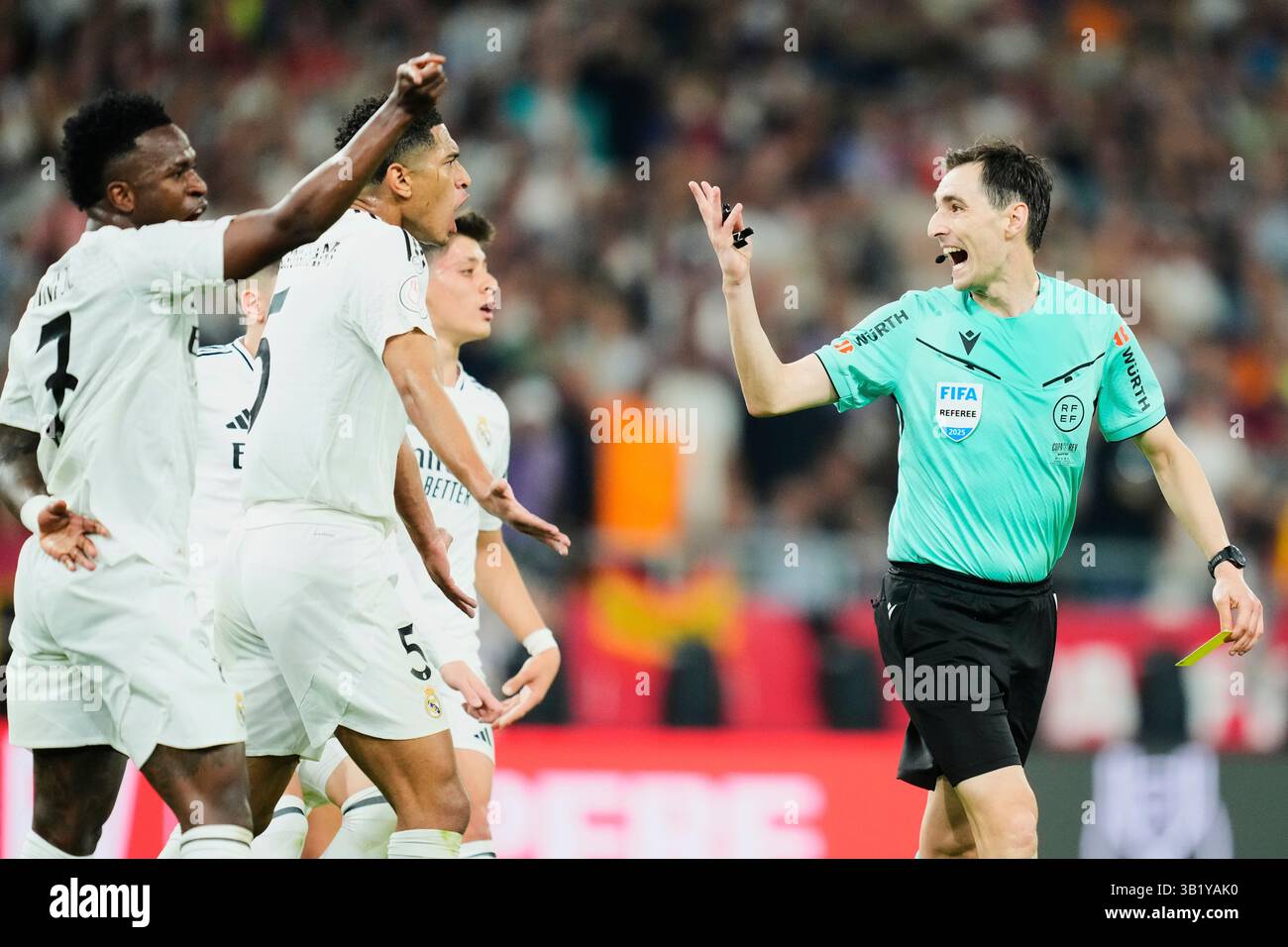 Real Madrid players argue with referee Ricardo De Burgos Bengoetxea ...