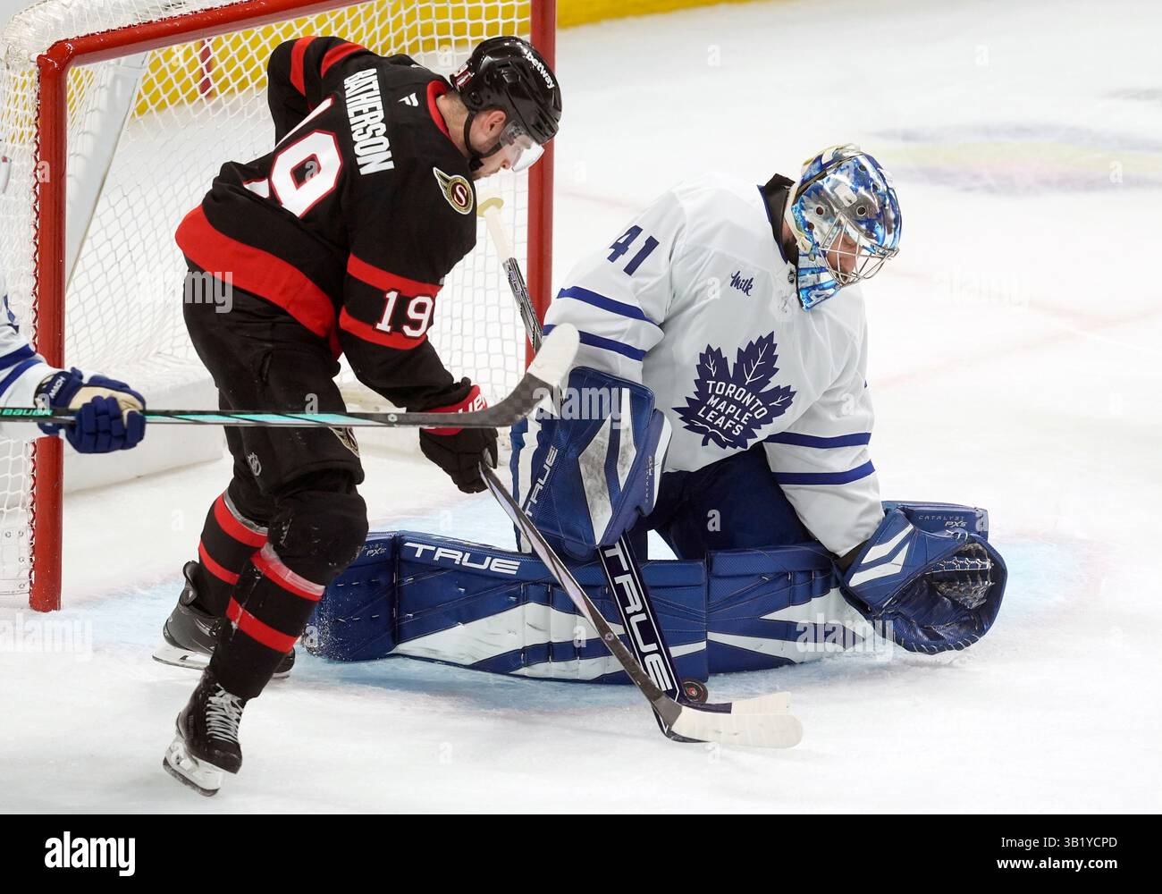 Ottawa Senators' Drake Batherson (19) pressures Toronto Maple Leafs ...