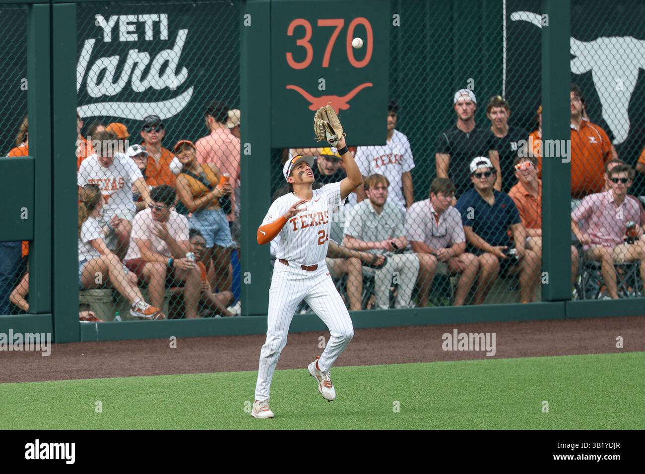 AUSTIN, TX - APRIL 26: Texas infielder Adrian Rodriguez (24) catches a ...