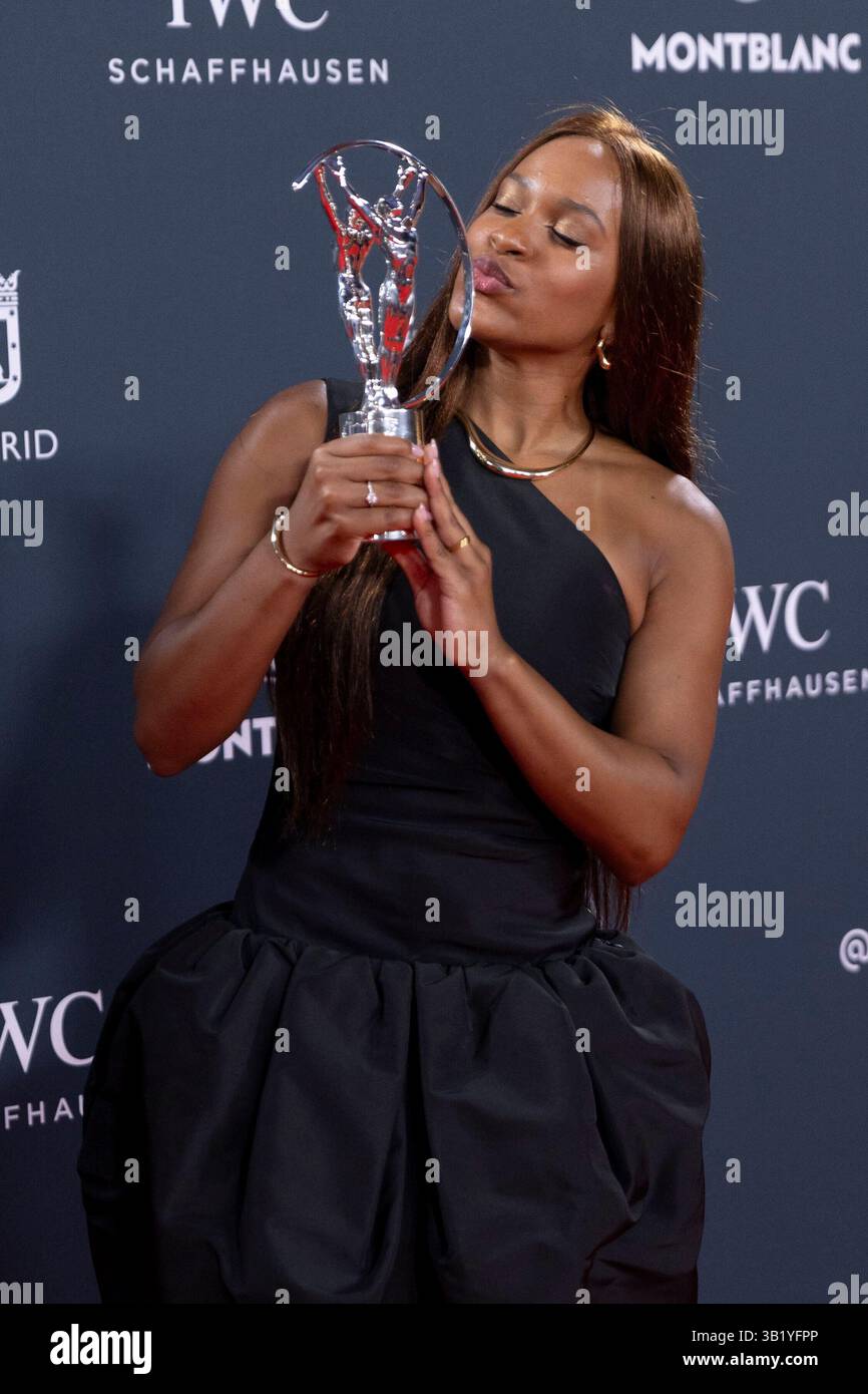 Simone Biles poses with the award during the 2025 Laureus World Sport ...