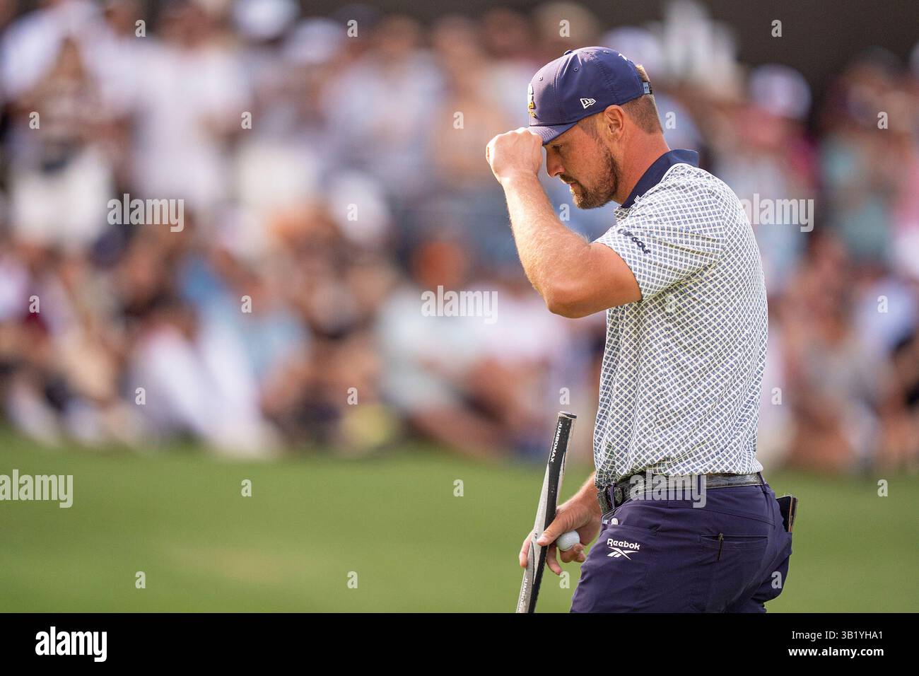 Captain Bryson DeChambeau of Crushers GC tips his cap on the 18th green during the second round ...
