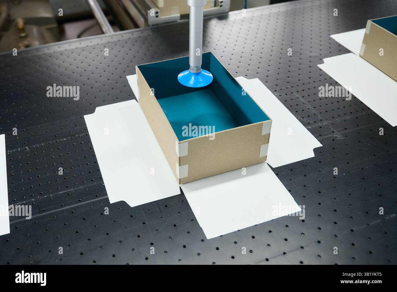 Innovative robotic gluing process at a box manufacturing plant ...