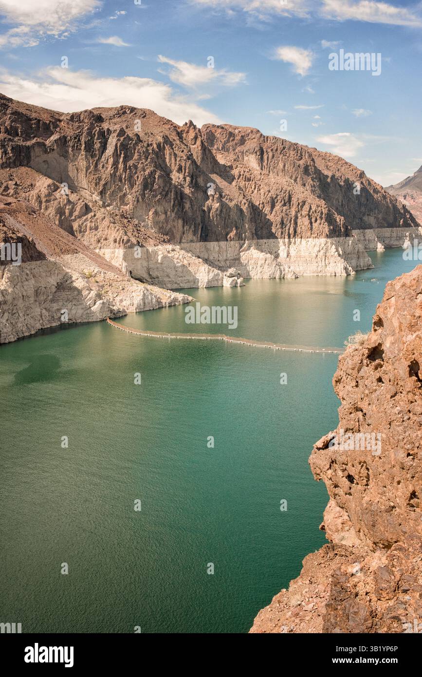 The Hoover Dam is located in Boulder City, Nevada near the border of ...