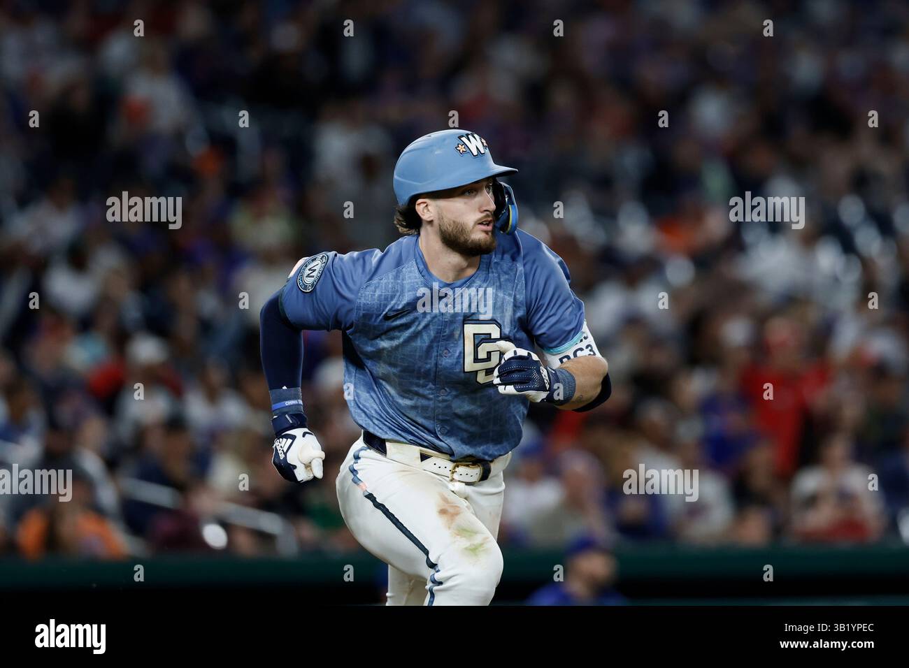 Washington Nationals' Dylan Crews runs after hitting a triple against ...