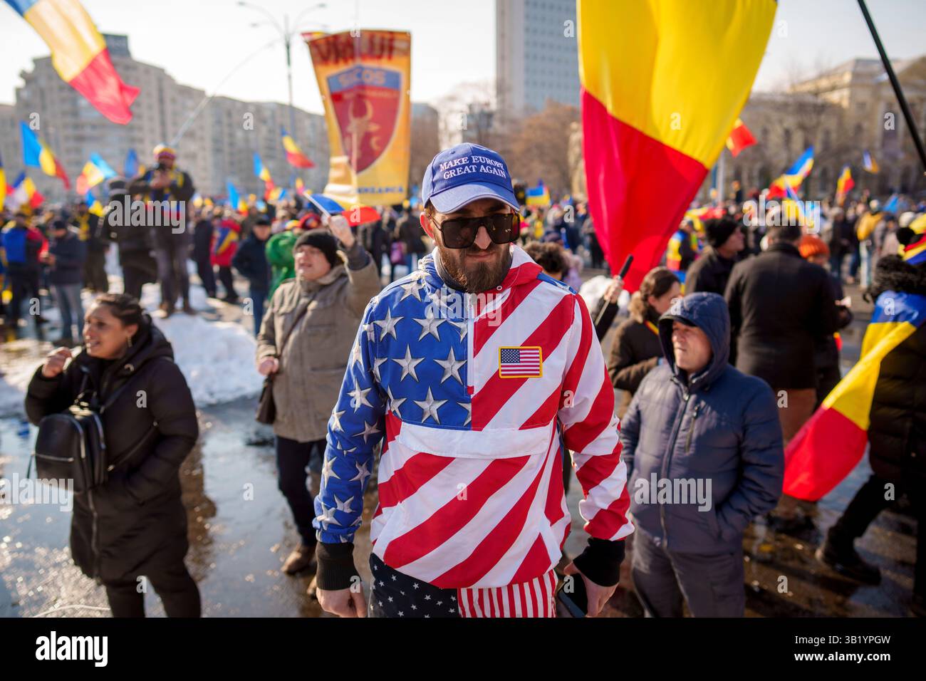 FILE - A man wears a U.S. flag themed outfit and a cap that reads "Make ...