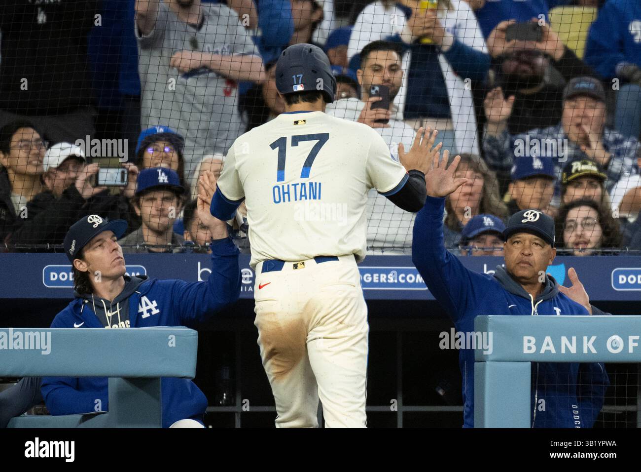 Los Angeles Dodgers' Shohei Ohtani, center, celebrates with bench coach ...