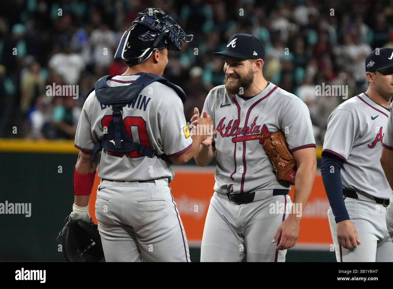 Atlanta Braves catcher Drake Baldwin (30) and pitcher Dylan Lee ...