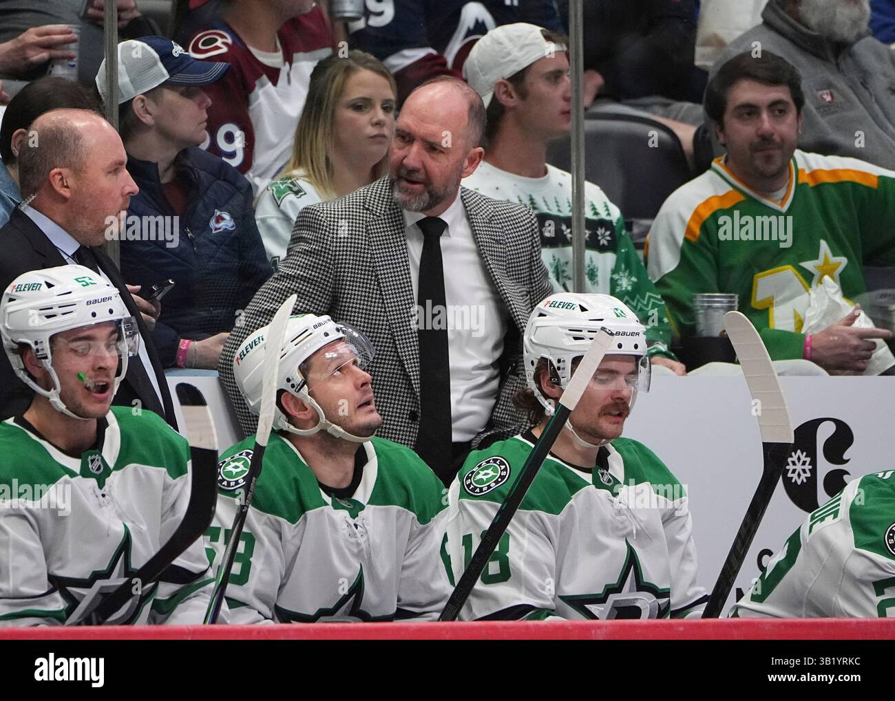 Dallas Stars head coach Peter DeBoer, back center, looks on fromt he ...