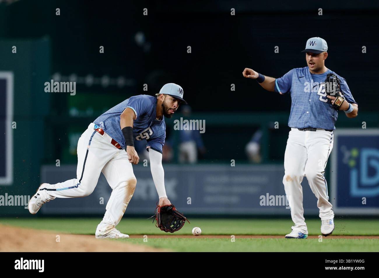 Washington Nationals second baseman Luis García Jr. fields a ground ...