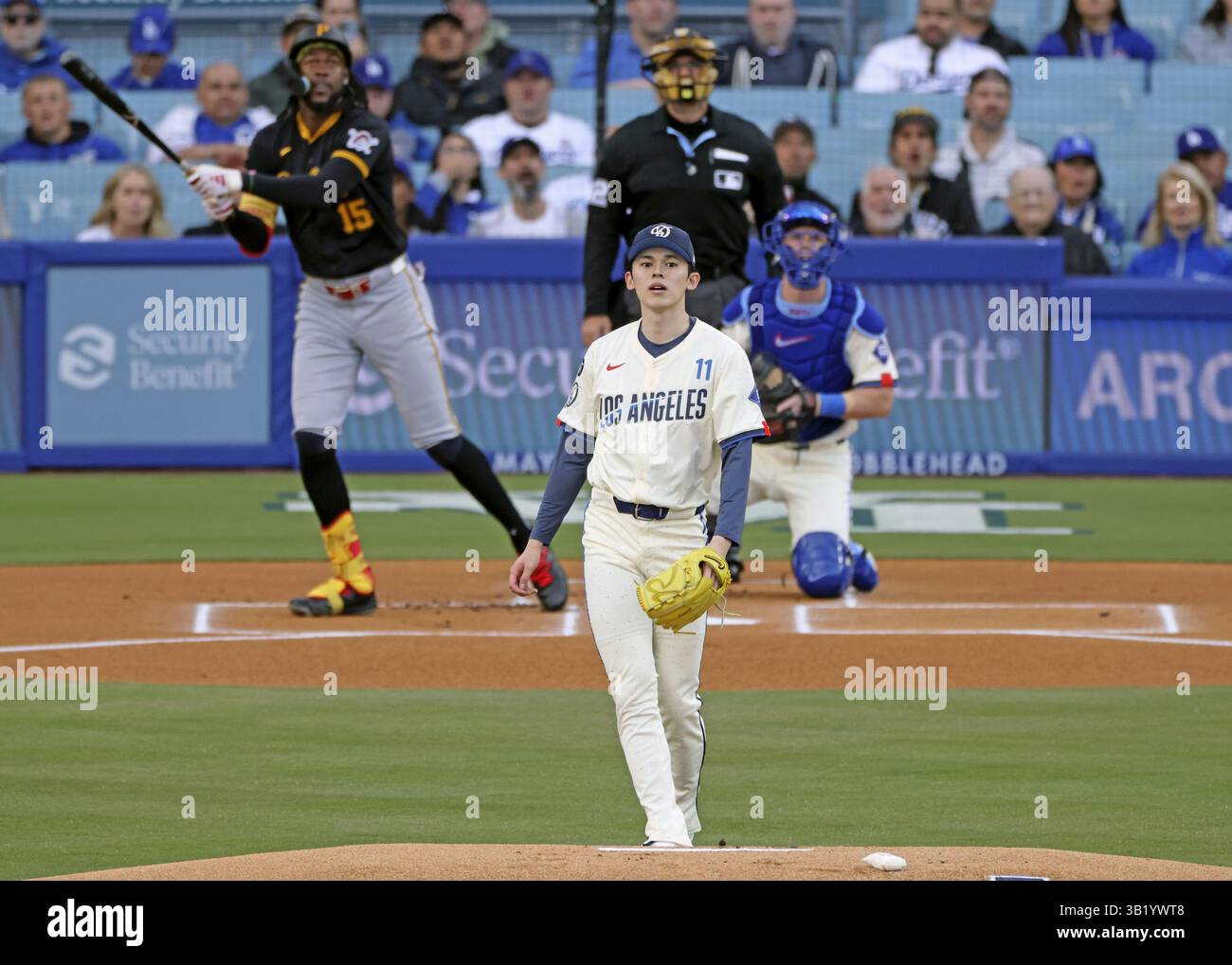 Los Angeles Dodgers right-hander Roki Sasaki reacts after giving up a ...