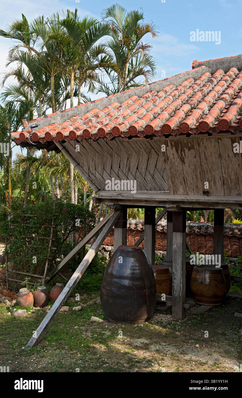 Traditional elevated Okinawan food storehouse with ceramic storage ...