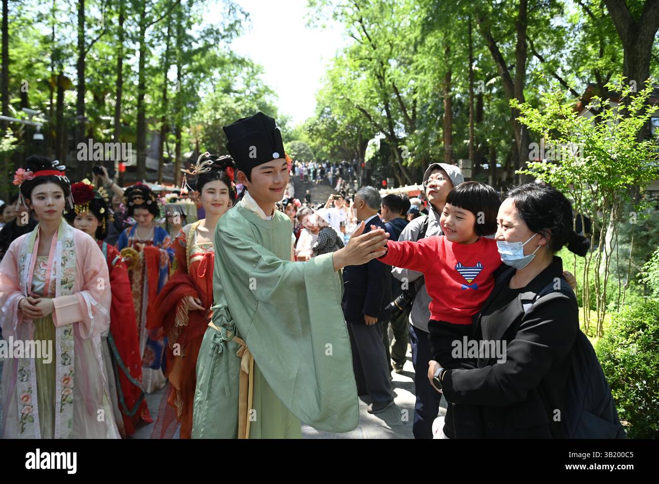 **CHINESE MAINLAND, HONG KONG, MACAU AND TAIWAN OUT** People take part ...