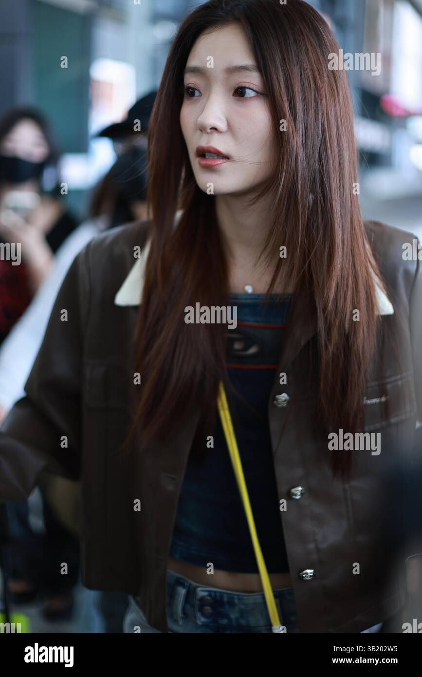 Chinese actress Luo Yutong appears at the airport in Shanghai, China ...