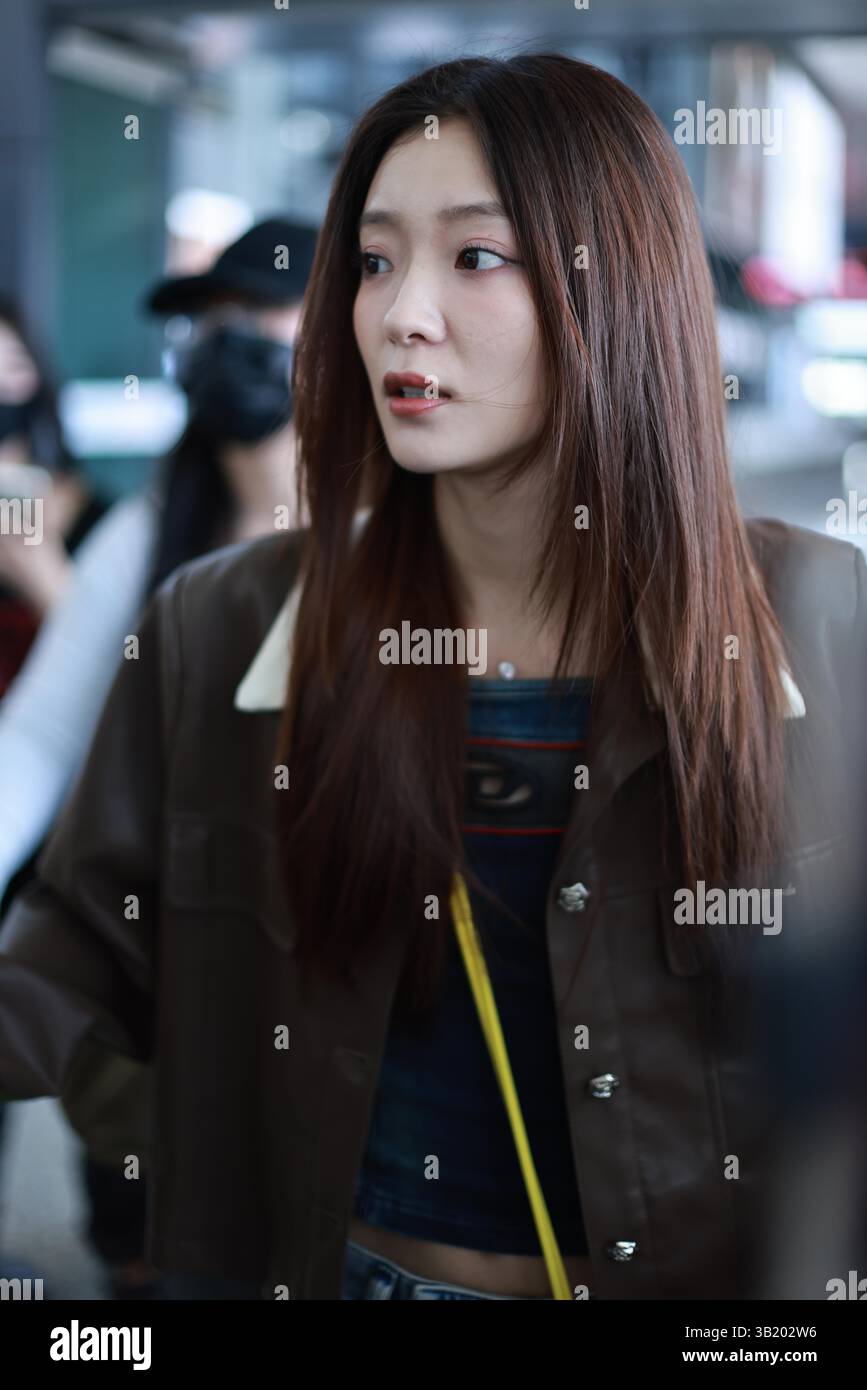 Chinese actress Luo Yutong appears at the airport in Shanghai, China ...