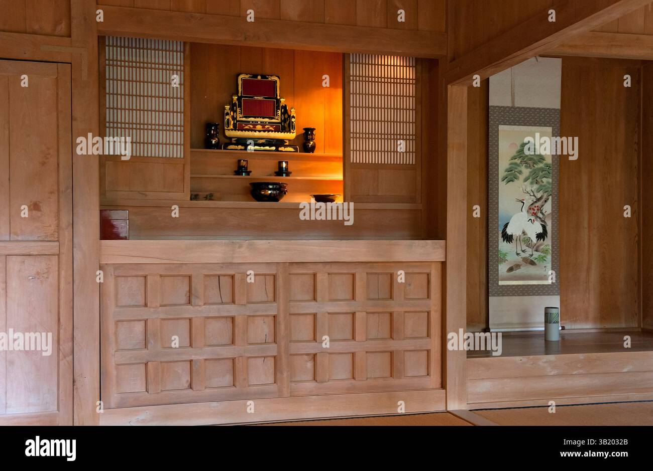 Kamidana deity altar and hanging scroll in tokonoma alcove with wood ...