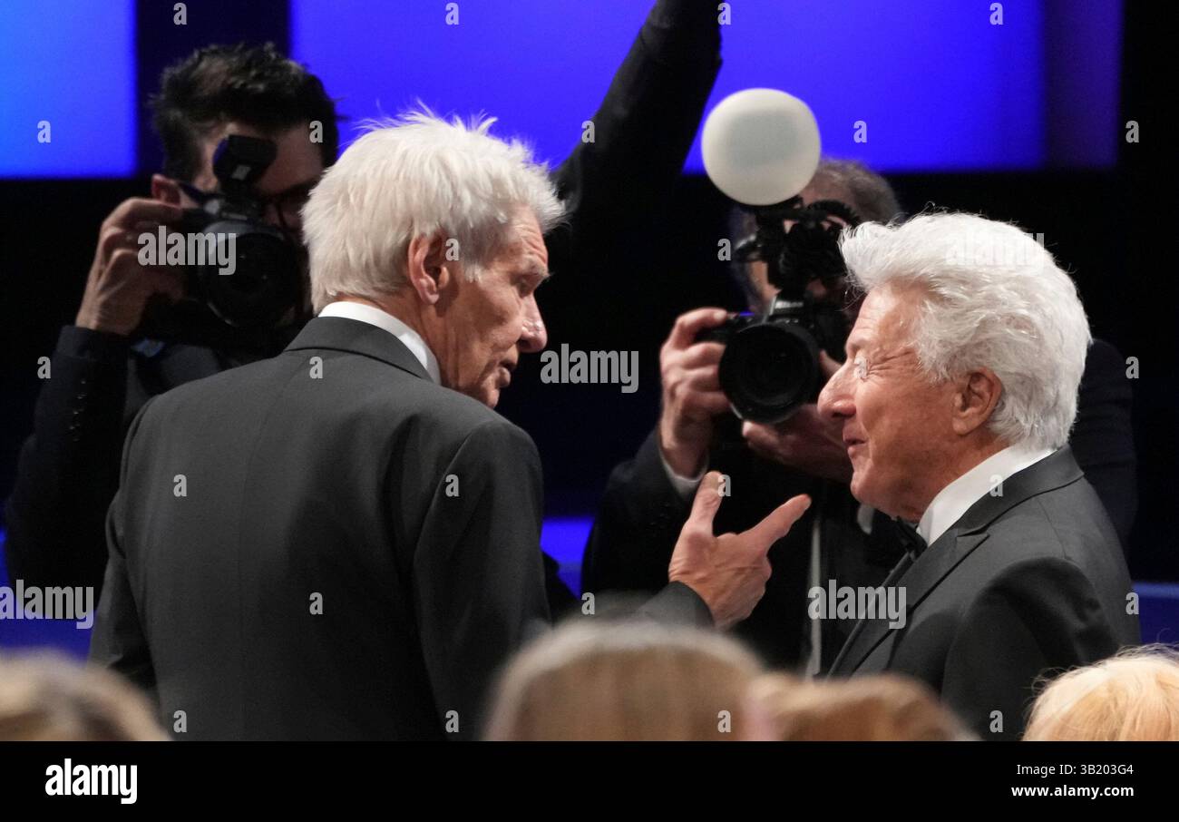 Actors Harrison Ford, left, and Dustin Hoffman mingle in the audience ...