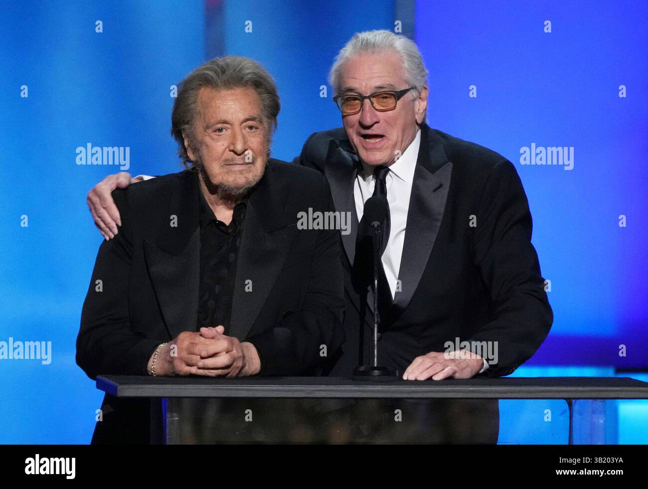 Actors Al Pacino, left, and Robert De Niro address the audience during ...