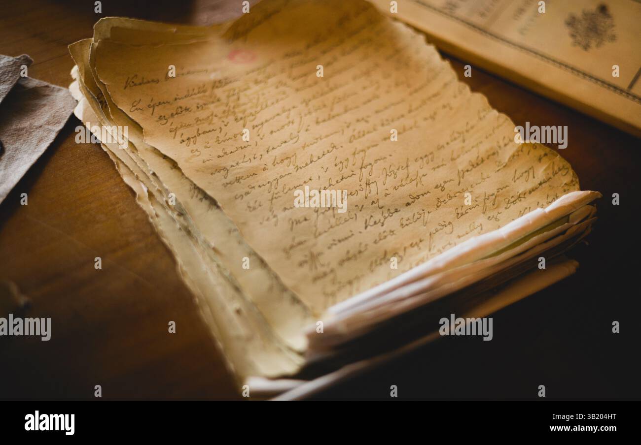 Vintage manuscripts and inkwell on the table Stock Photo - Alamy