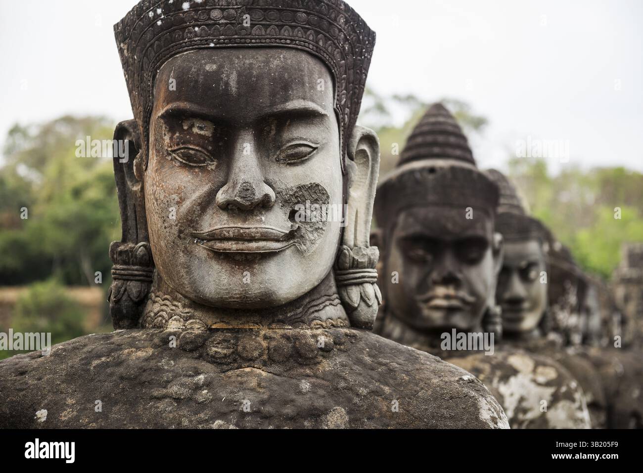 Figures on the bridge to Angkor Thom, sunset, Angkor Wat, Angkor ...