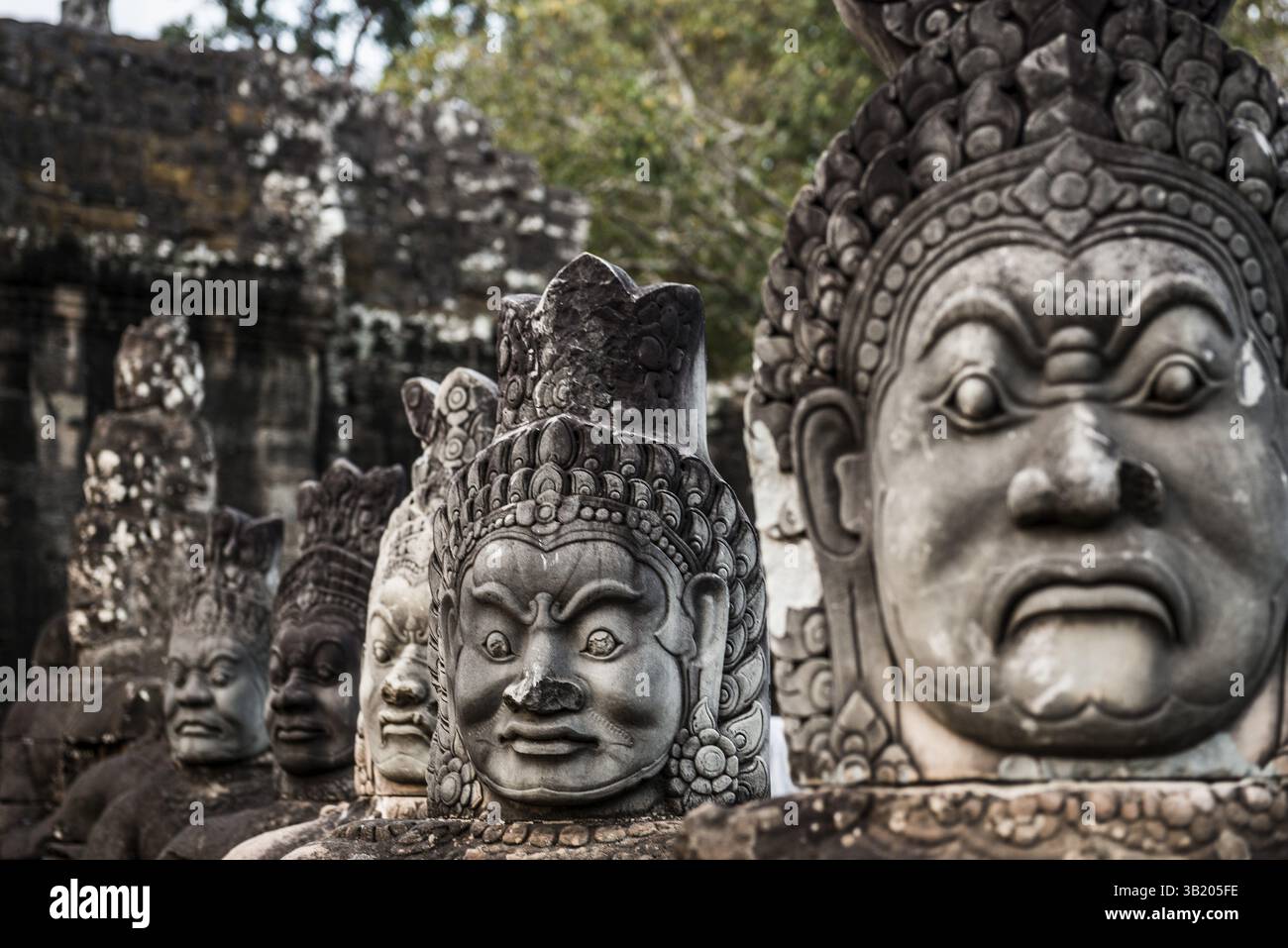 Figures on the bridge to Angkor Thom, sunset, Angkor Wat, Angkor ...