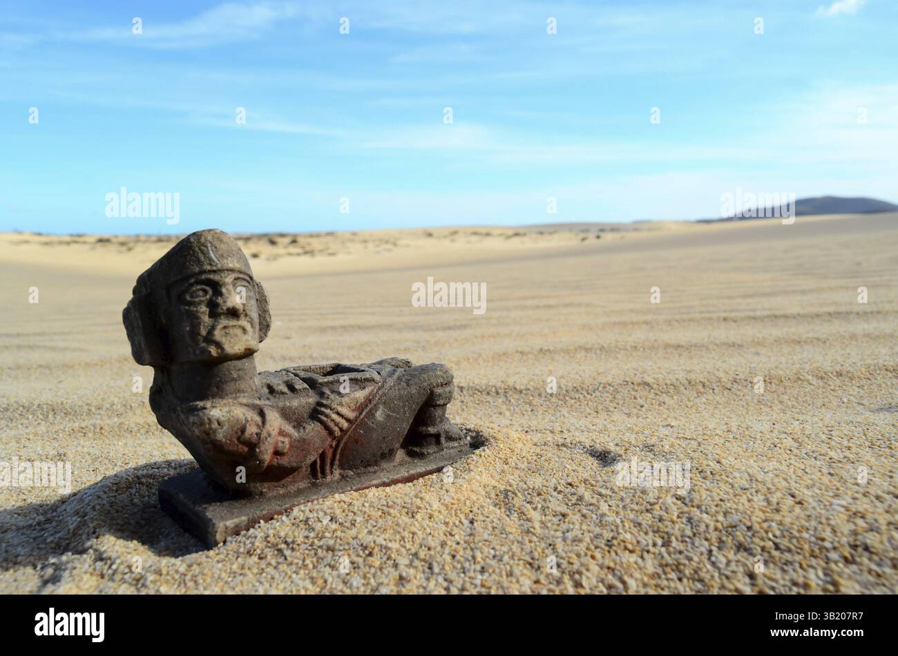 Conceptual a Mayan Statue in the dry desert Stock Photo - Alamy