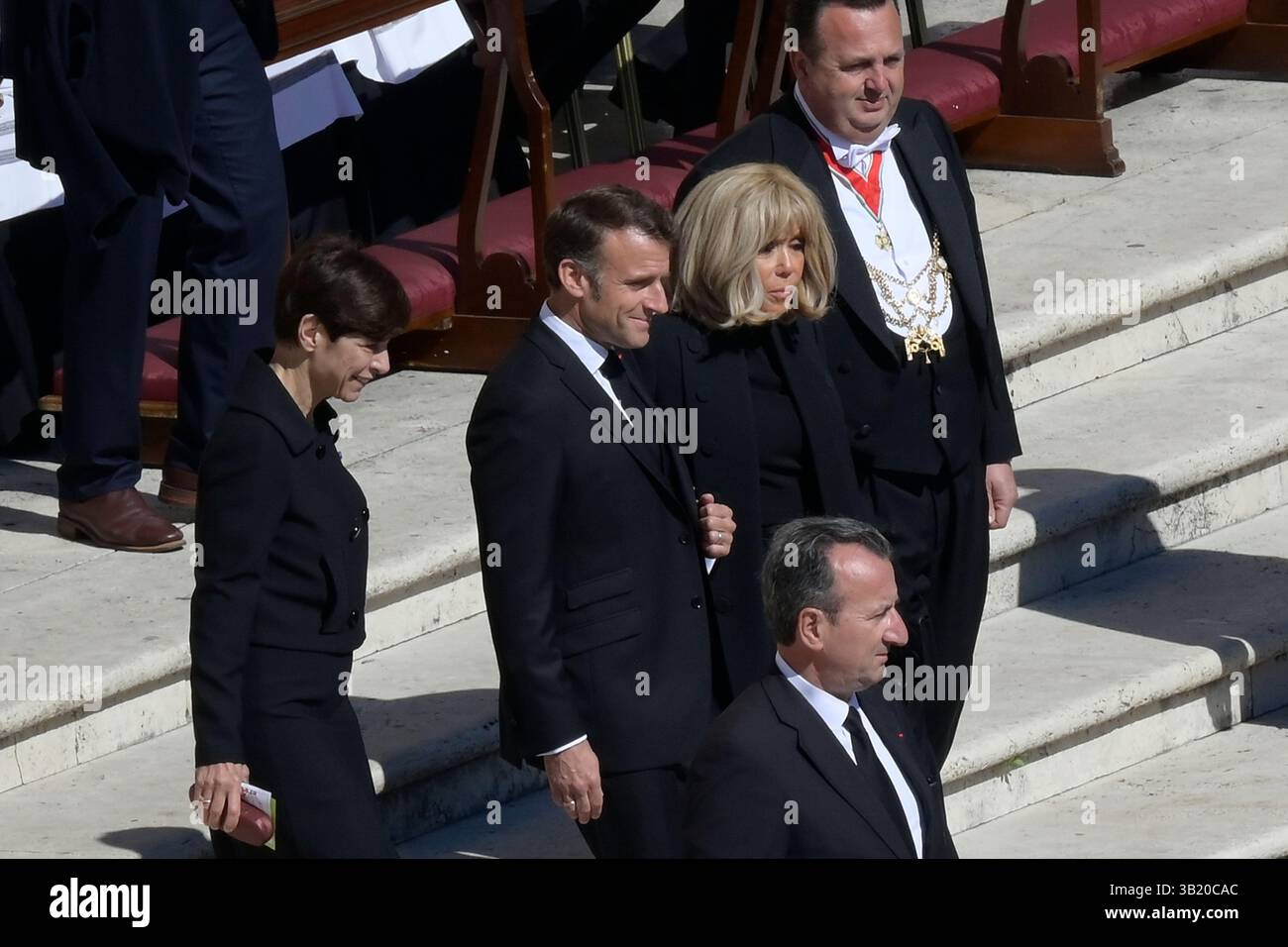 Vatican City, Italy. 26th Apr, 2025. Emmanuel Macron (l) and his wife ...