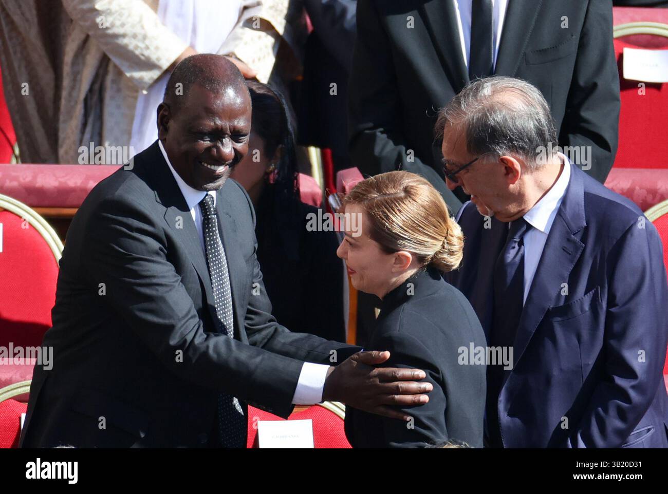 Vatican. 26th Apr, 2025. Kenyan President William Ruto (L) talks with ...