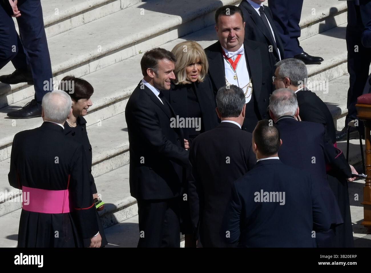 Vatican City, Italy. 26th Apr, 2025. Emmanuel Macron (l) and his wife ...
