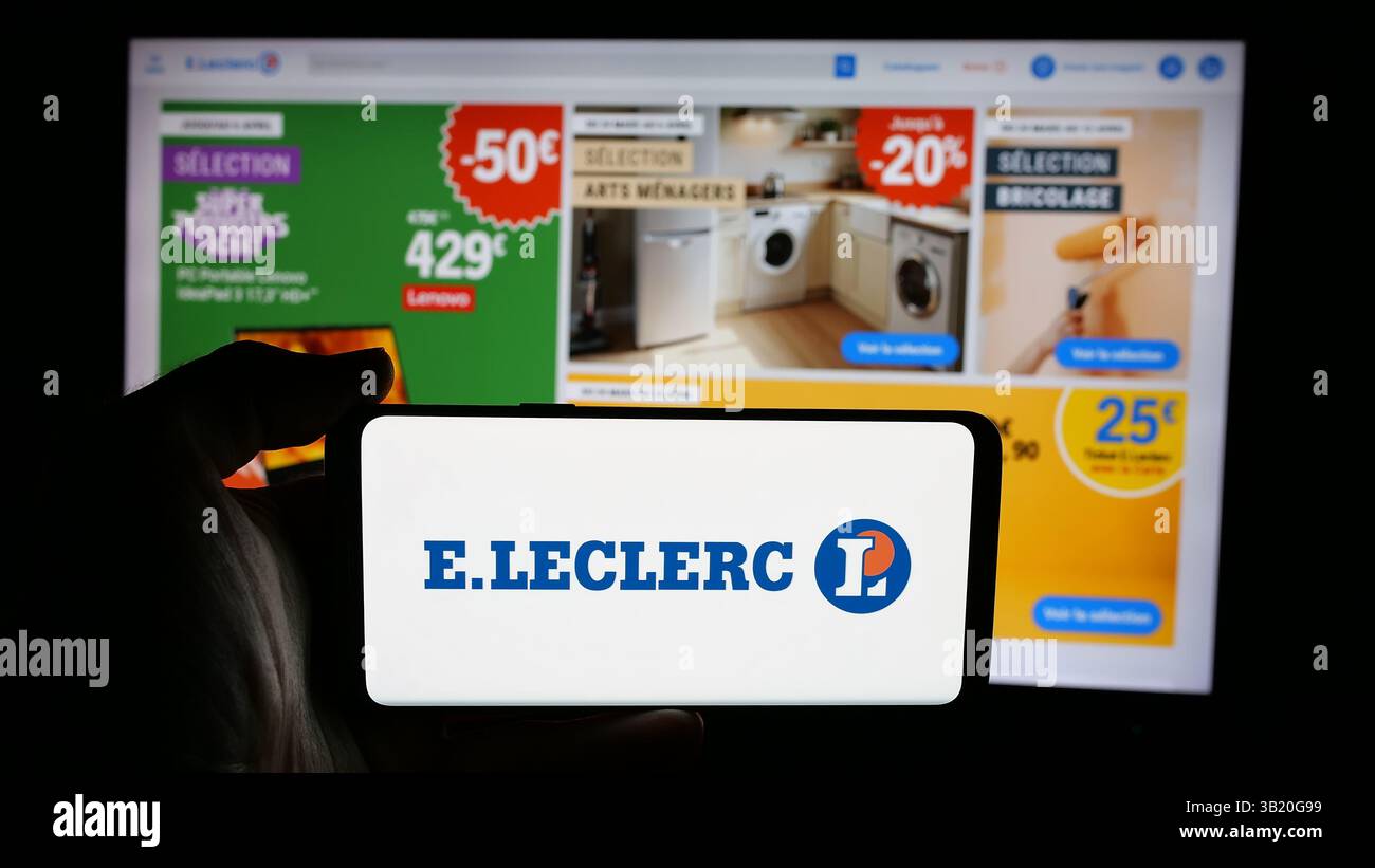 Germany. 24th Mar, 2025. In this photo illustration, a person is holding a cellphone with the ...