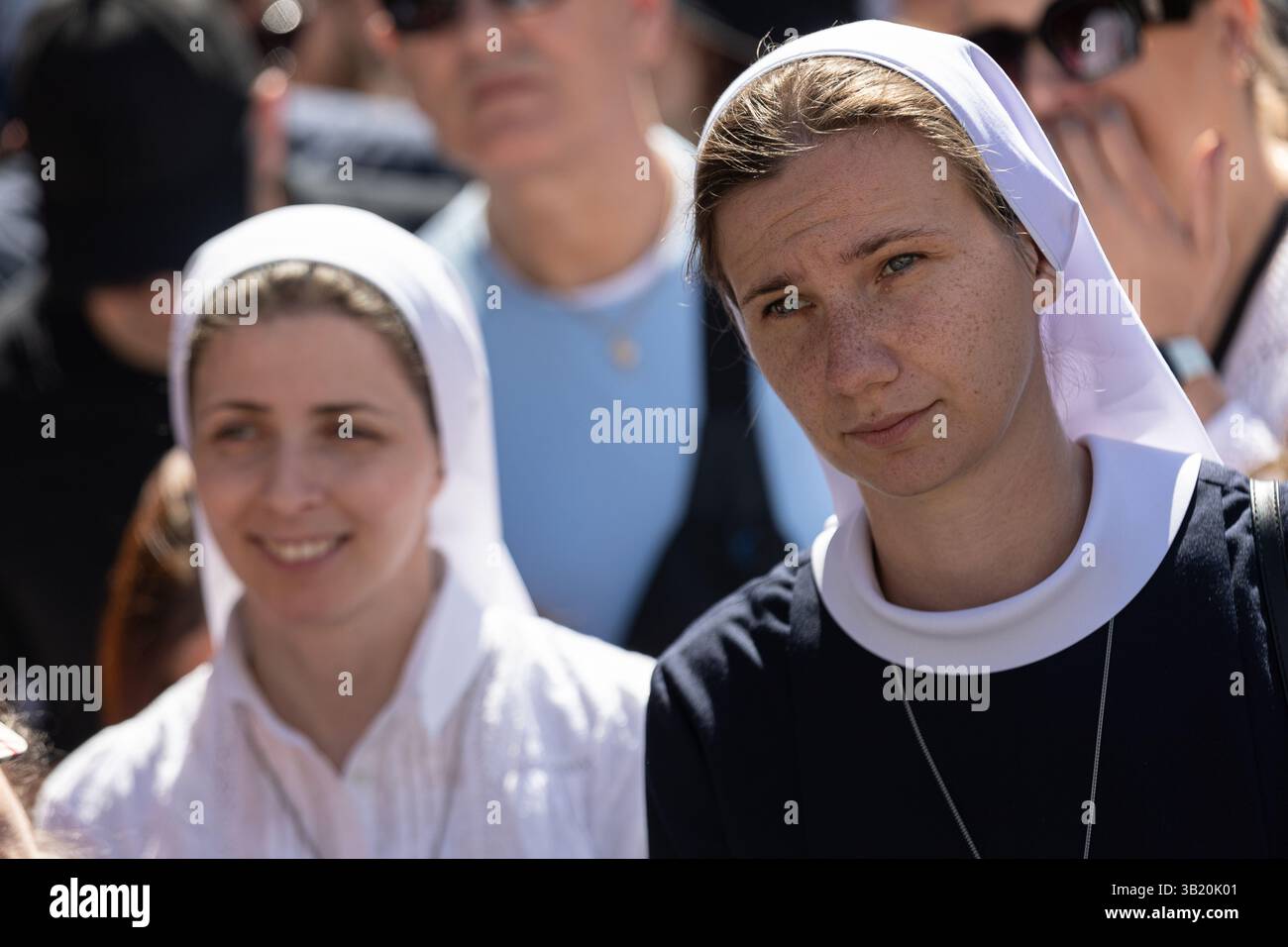Rome, Italy. 26th Apr, 2025. Catholic nuns are seen reflecting the solemn tribute offered by ...
