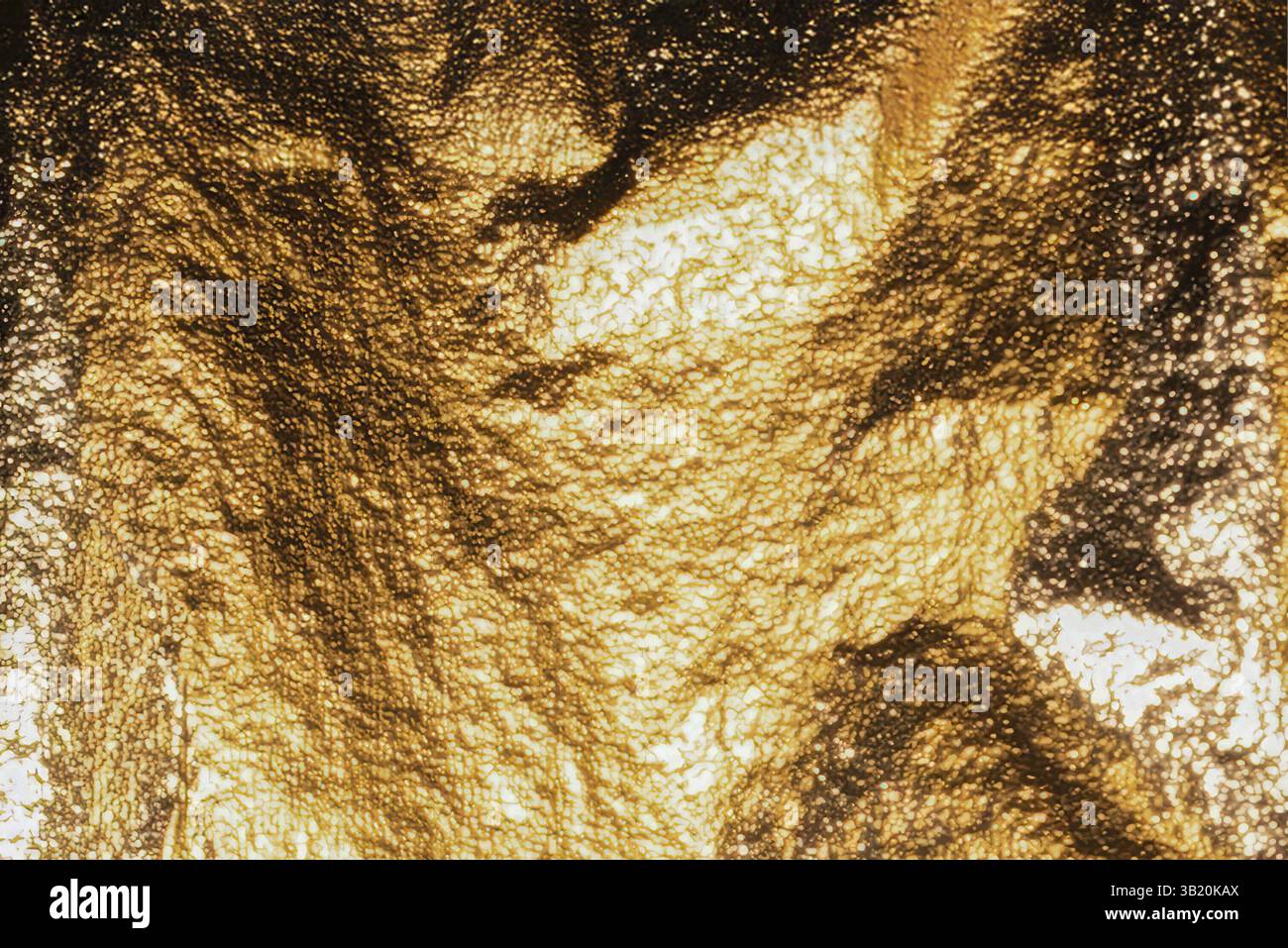 Gold and golden foil background with grainy texture and sleek finish ...