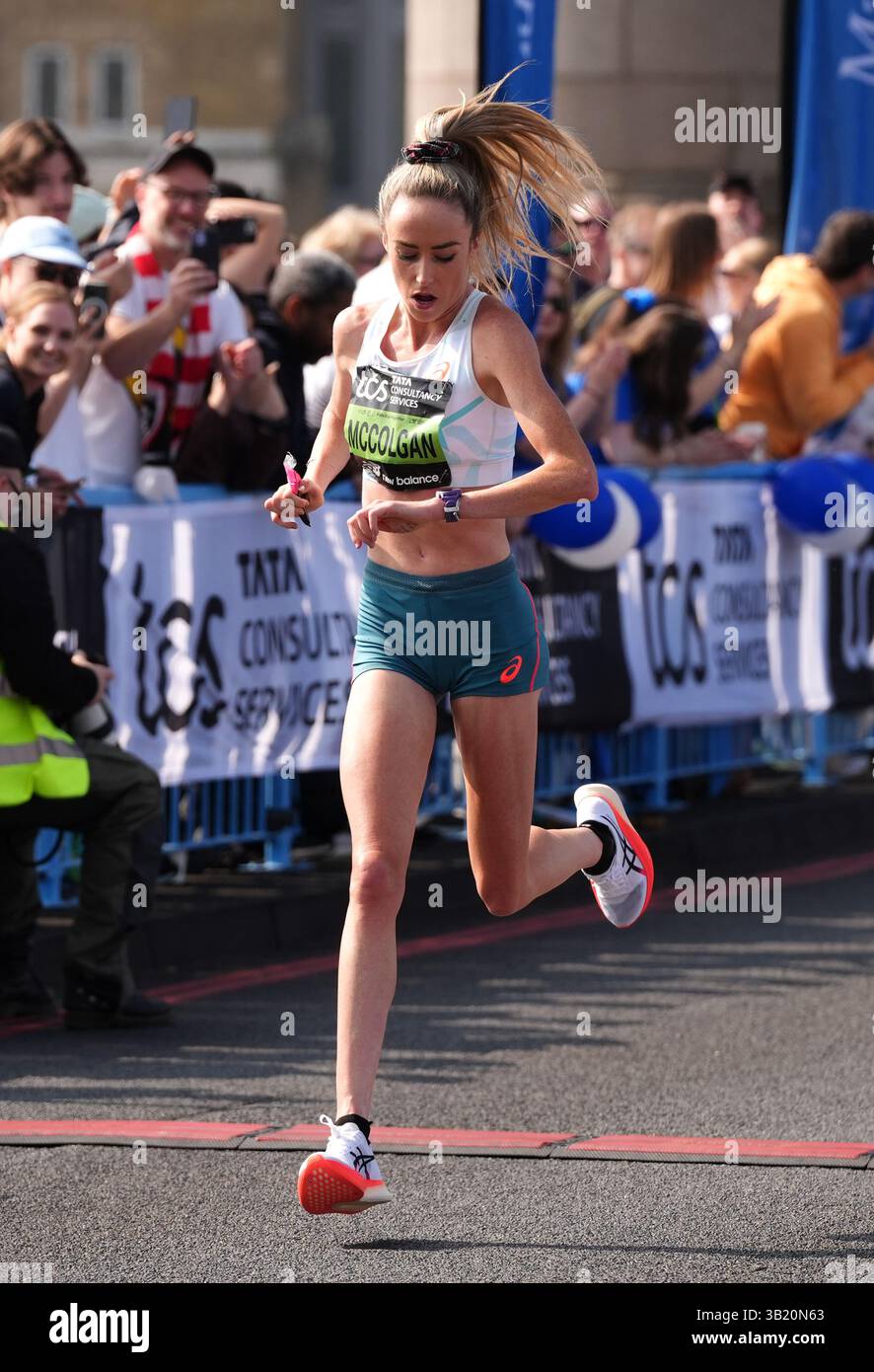 Eilish McColgan competing in the women's elite race crossing Tower ...