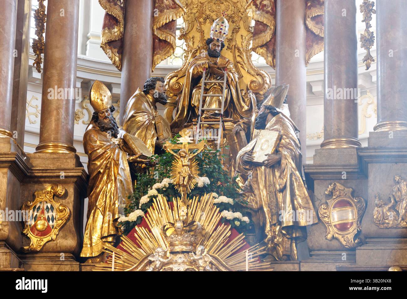 27 April 2025, Bavaria, Munich: A ladder leans against the figure of ...