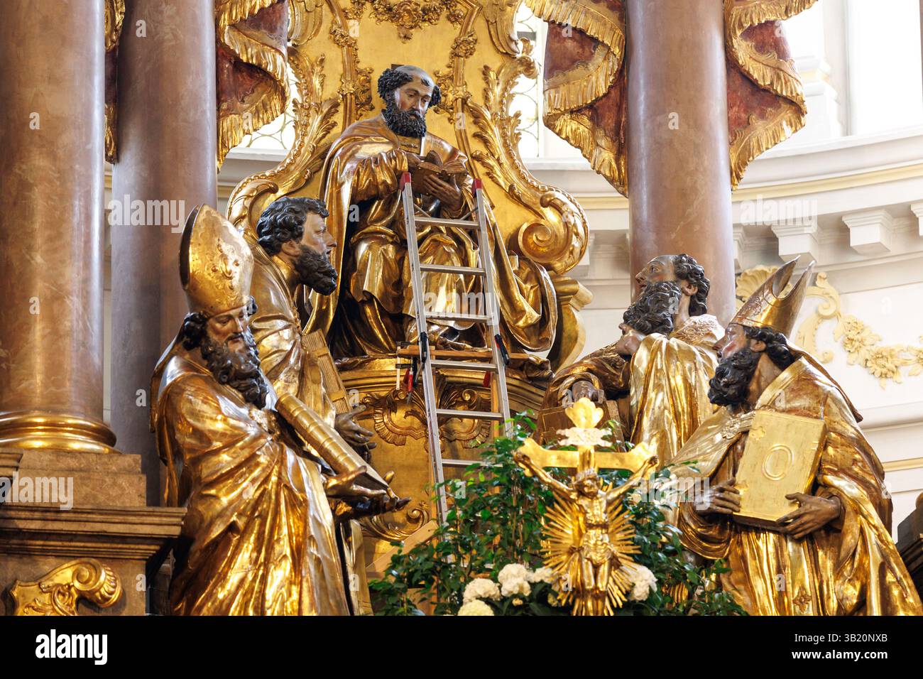 27 April 2025, Bavaria, Munich: A ladder leans against the figure of ...