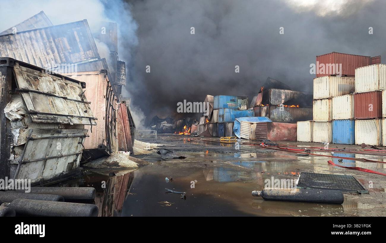 Containers burn, Sunday, April 27, 2025, after a massive explosion and ...