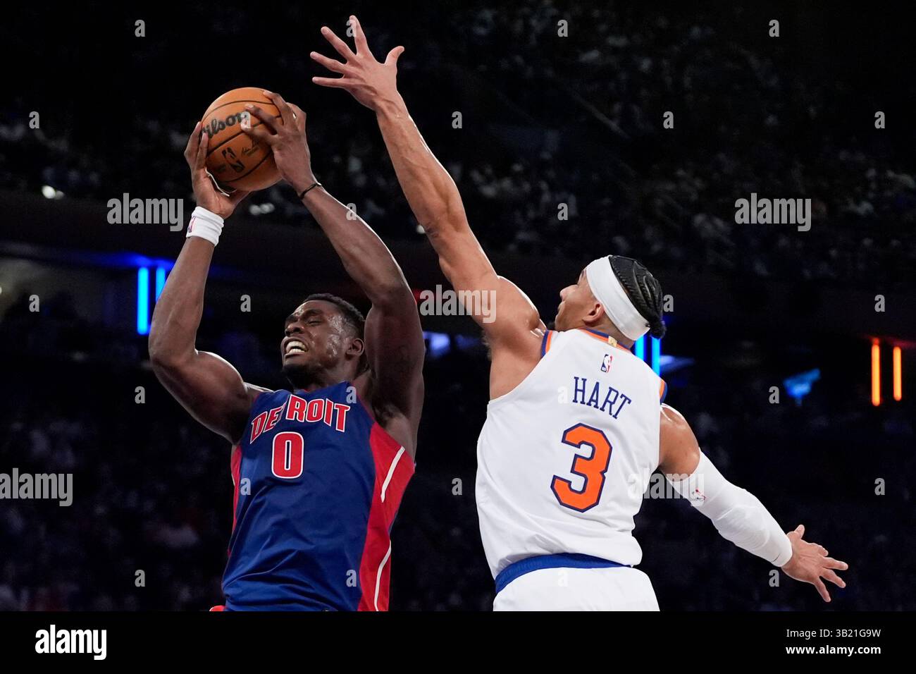 New York Knicks guard Josh Hart (3), right, attempts to block Detroit ...
